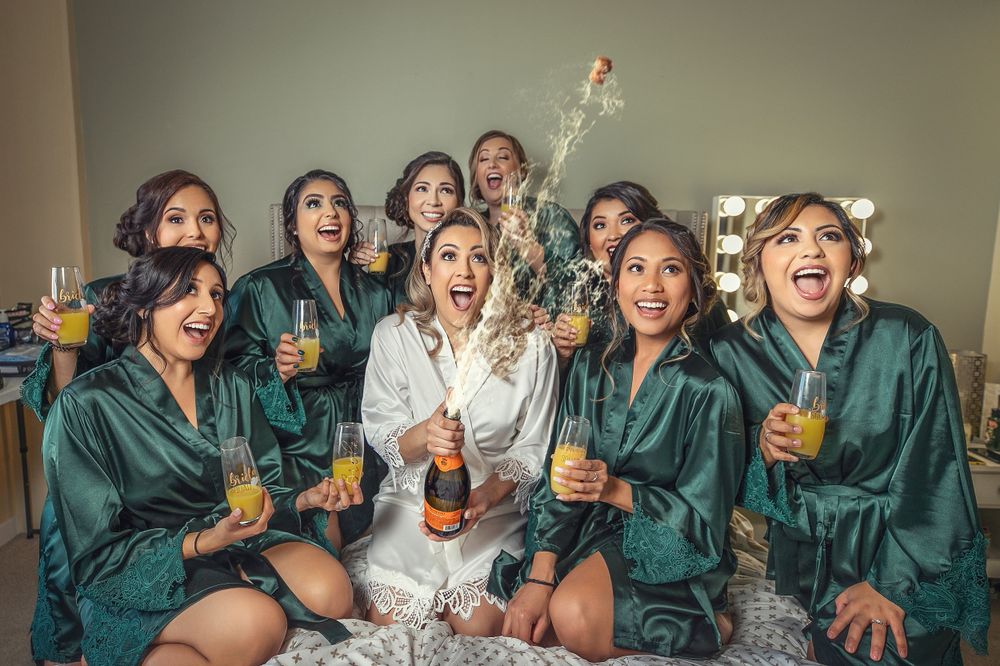 Capturing the Joy: Popping Champagne Moments - Impact Images Studio