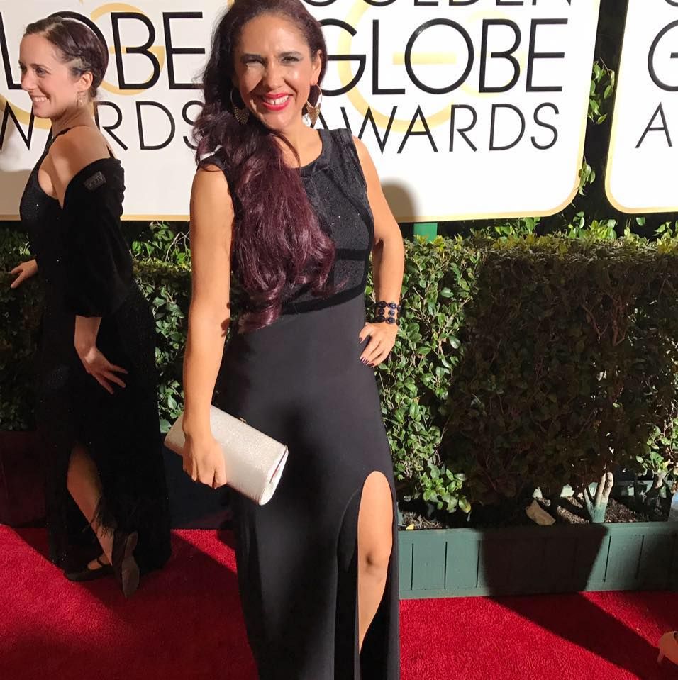 About - Norma Medina Russell