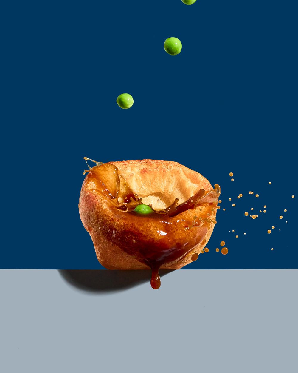 Yorkshire pudding, gravy and peas splash food photography - Nancy Anne ...