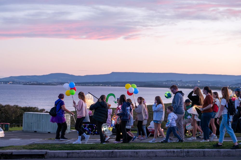 Golden light, glowing lanterns: Photographing a community parade - Me ...